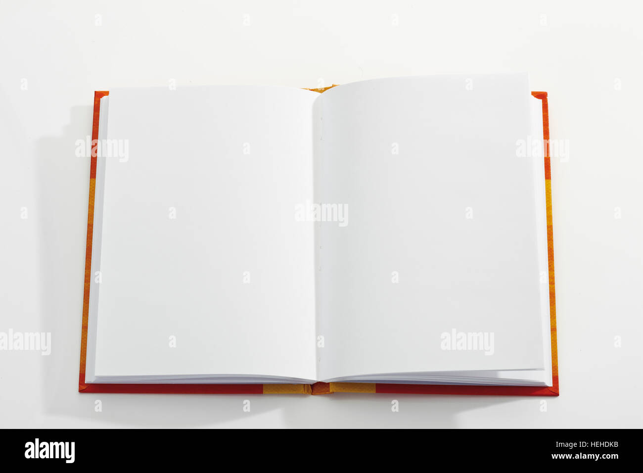 Opened notebook showing blank pages Stock Photo - Alamy