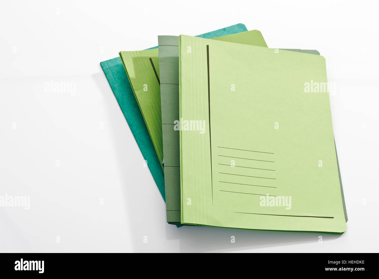 Stack of green office folders, files Stock Photo - Alamy