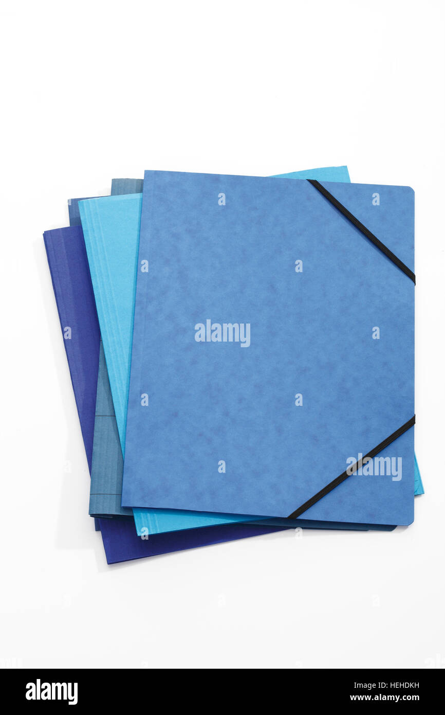 Stack of blue cardboard office folders, files Stock Photo - Alamy