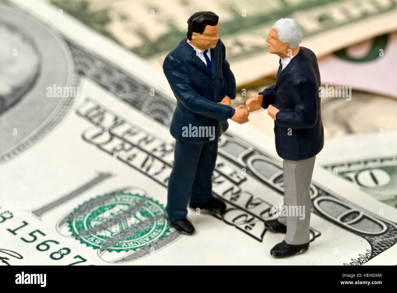 Symbolic shot, trade, business deal, US dollars Stock Photo - Alamy