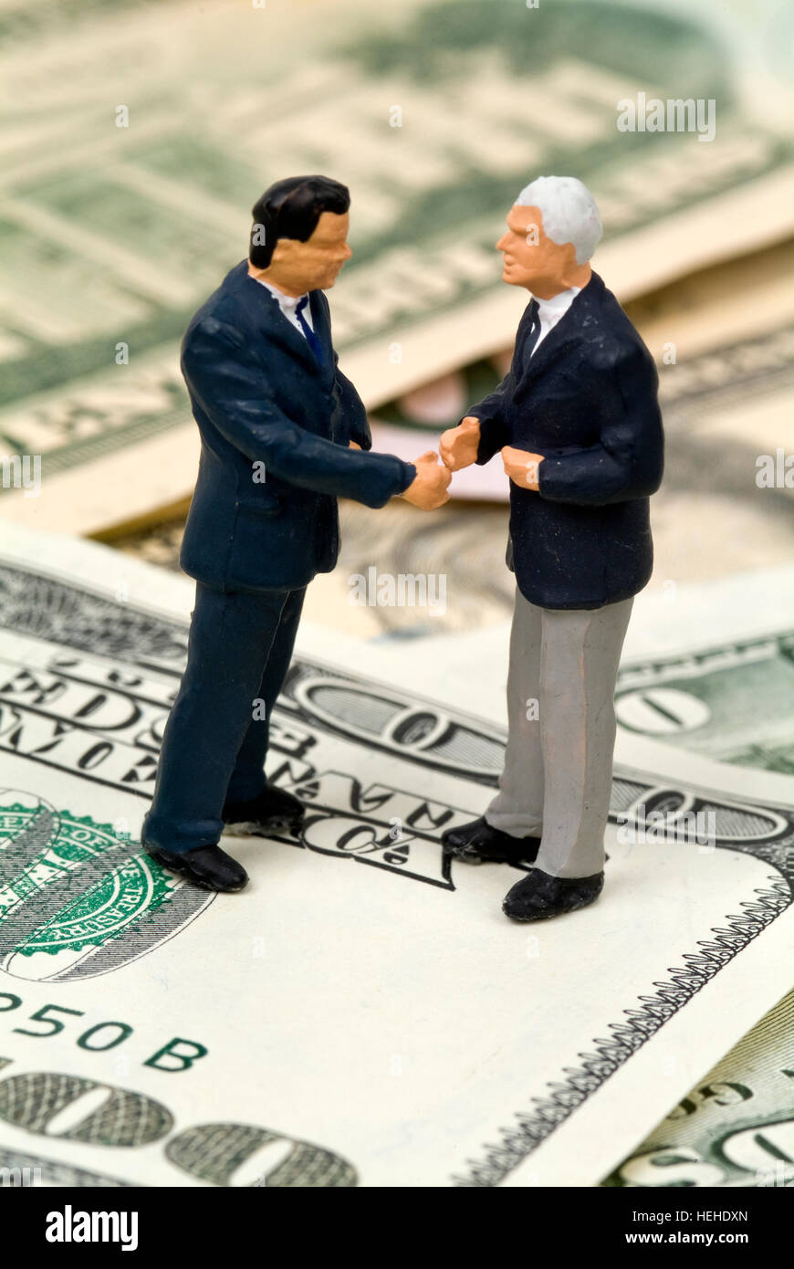 Symbolic shot, trade, business deal, US dollars Stock Photo - Alamy