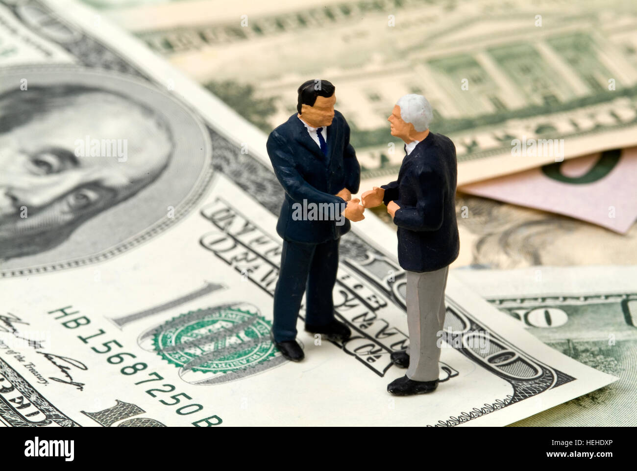 Symbolic shot, trade, business deal, US dollars Stock Photo - Alamy