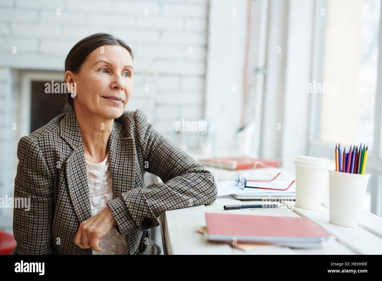 Experienced professional having rest in coffee-shop Stock Photo - Alamy