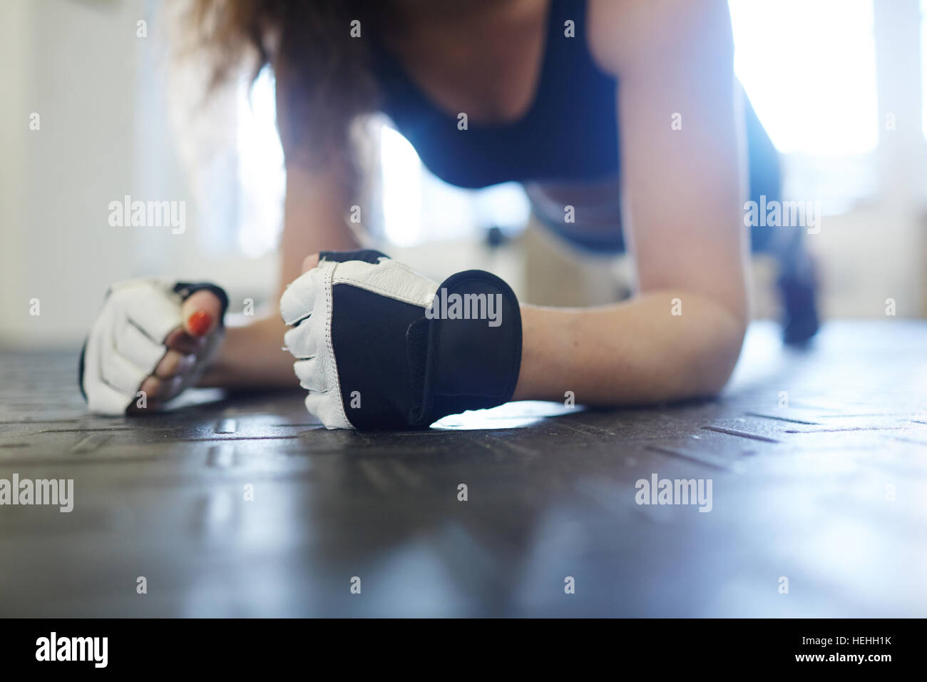 Woman doing planks during workout Stock Photo - Alamy