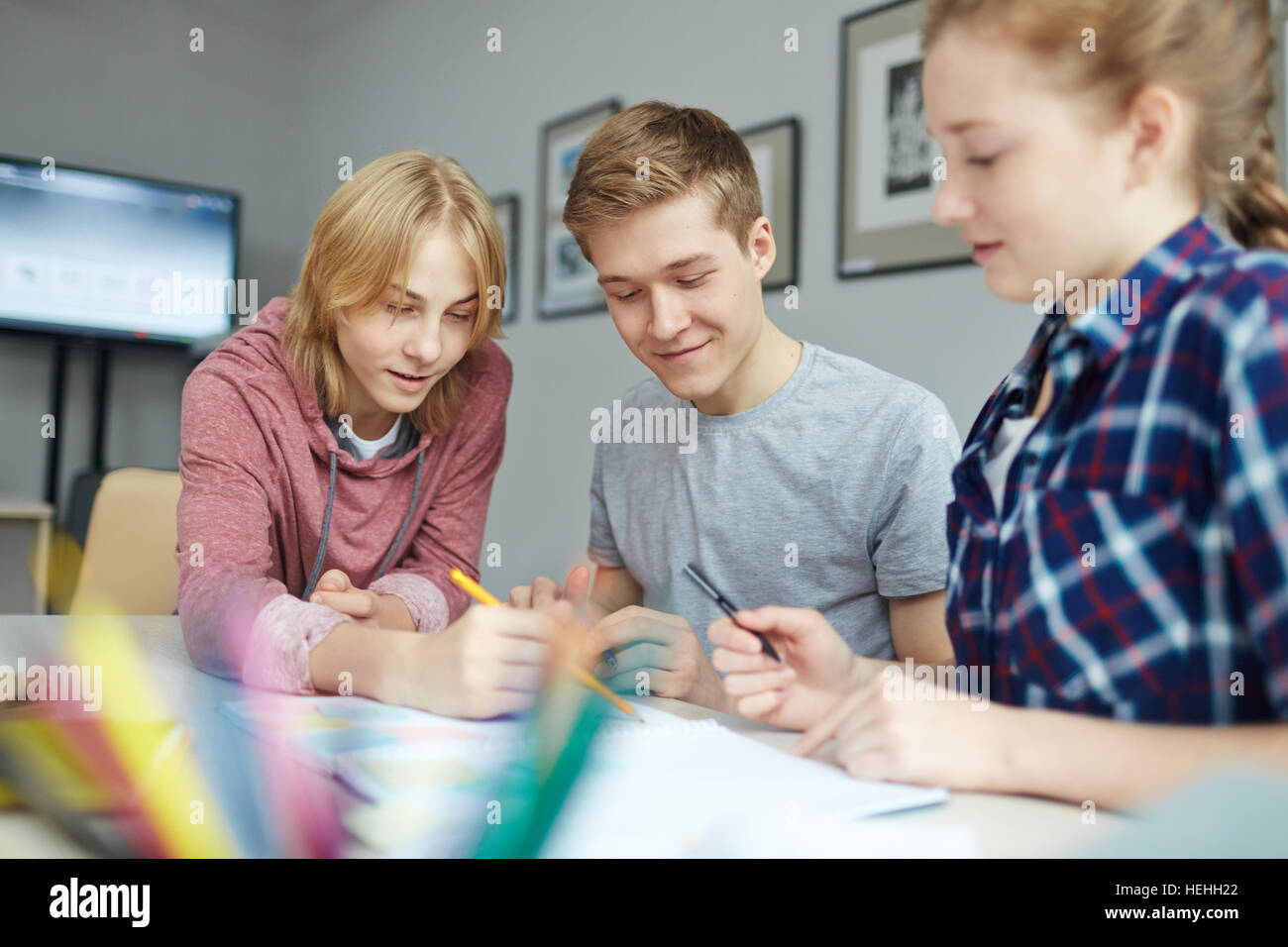 Clever students discussing their creative ideas Stock Photo - Alamy