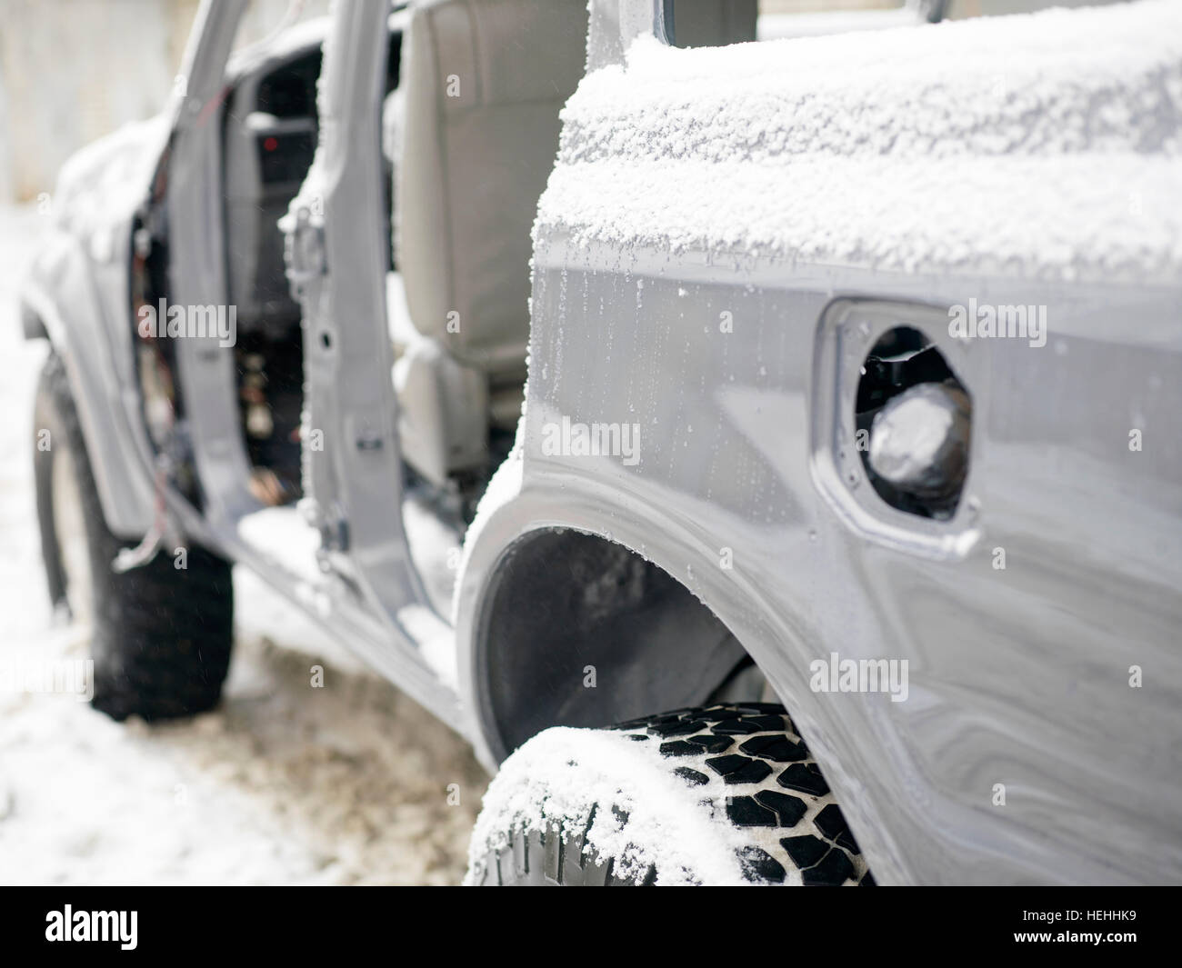 Abandoned partially disassembled car Stock Photo - Alamy