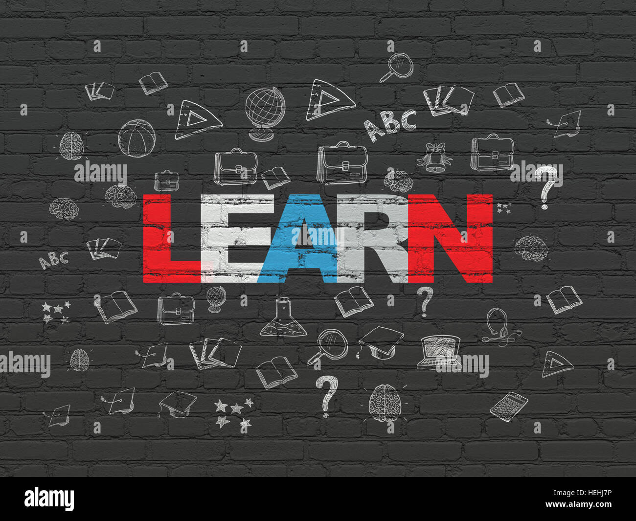 Learning concept: Learn on wall background Stock Photo - Alamy