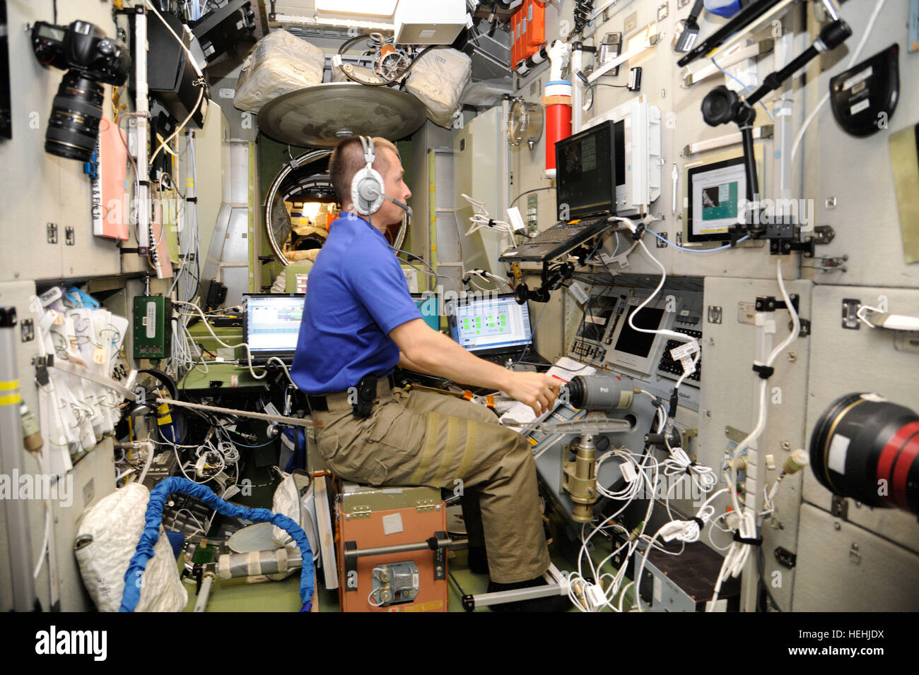 NASA Expedition 50 crew member Russian cosmonaut Sergey Ryzhikov uses ...