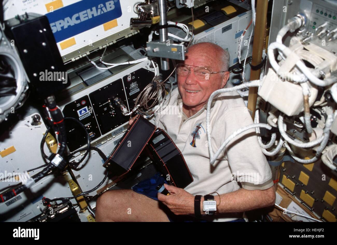 NASA STS-95 mission astronaut John Glenn moves Advanced Organic ...