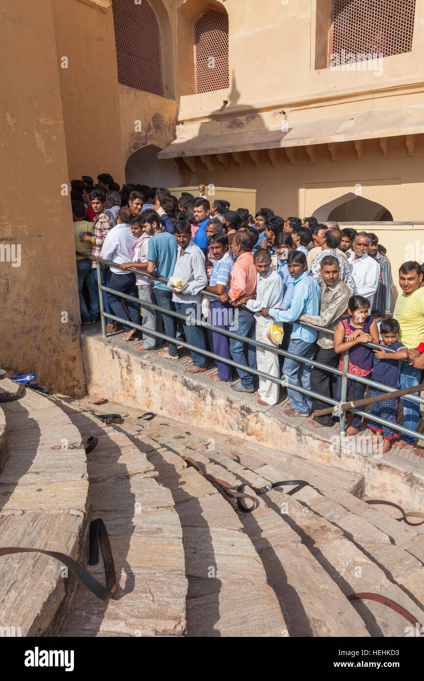 Devotees queuing hi-res stock photography and images - Alamy