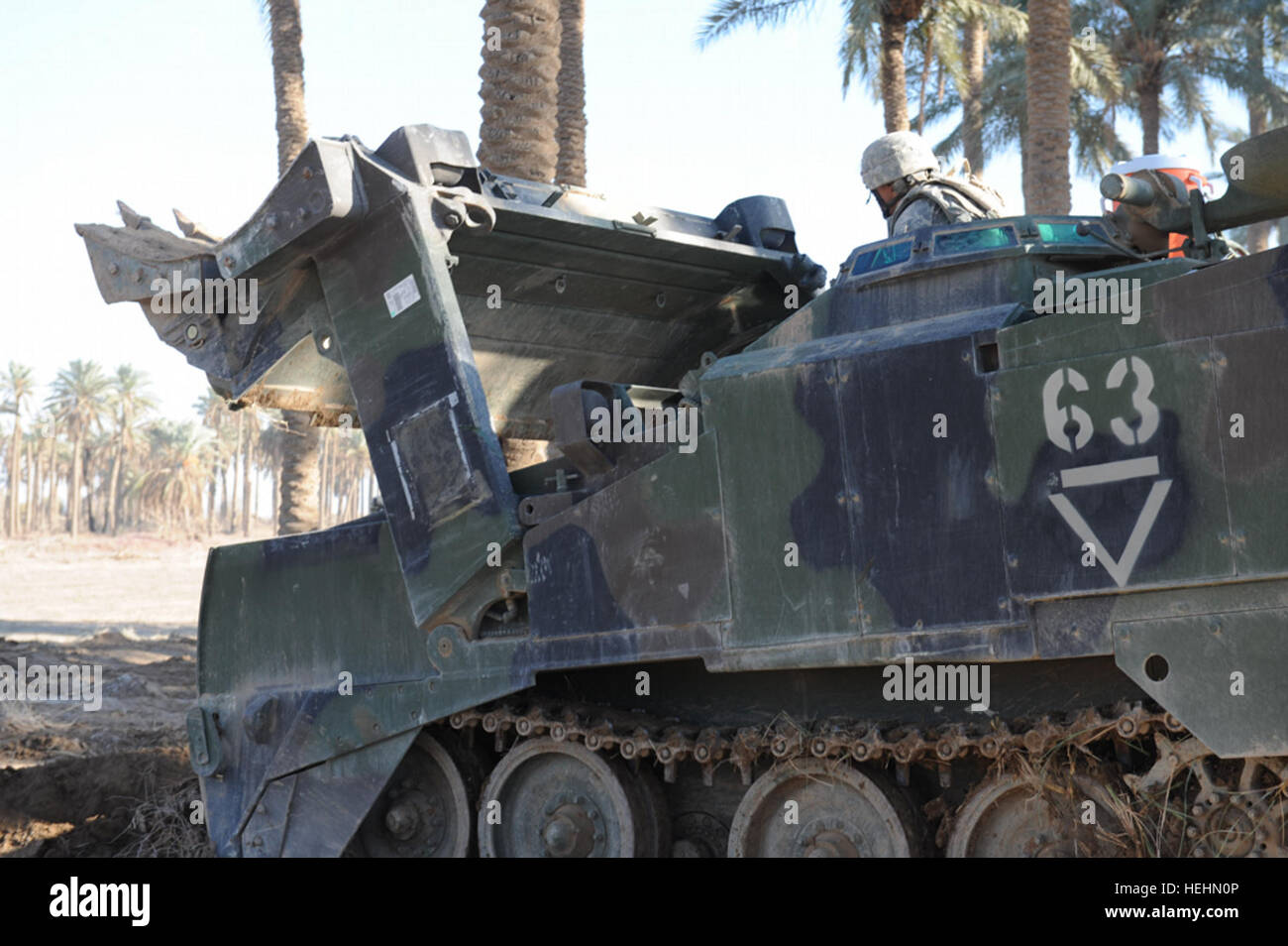 U.S. Army Spc. Teddy Hopkins, with 40th Engineer Battalion, 2nd Brigade ...