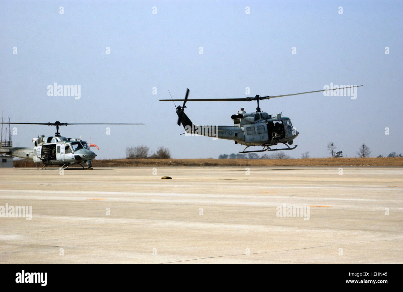 USMC UH-1N Iroquois helicopters take off from Camp Humphreys, South ...