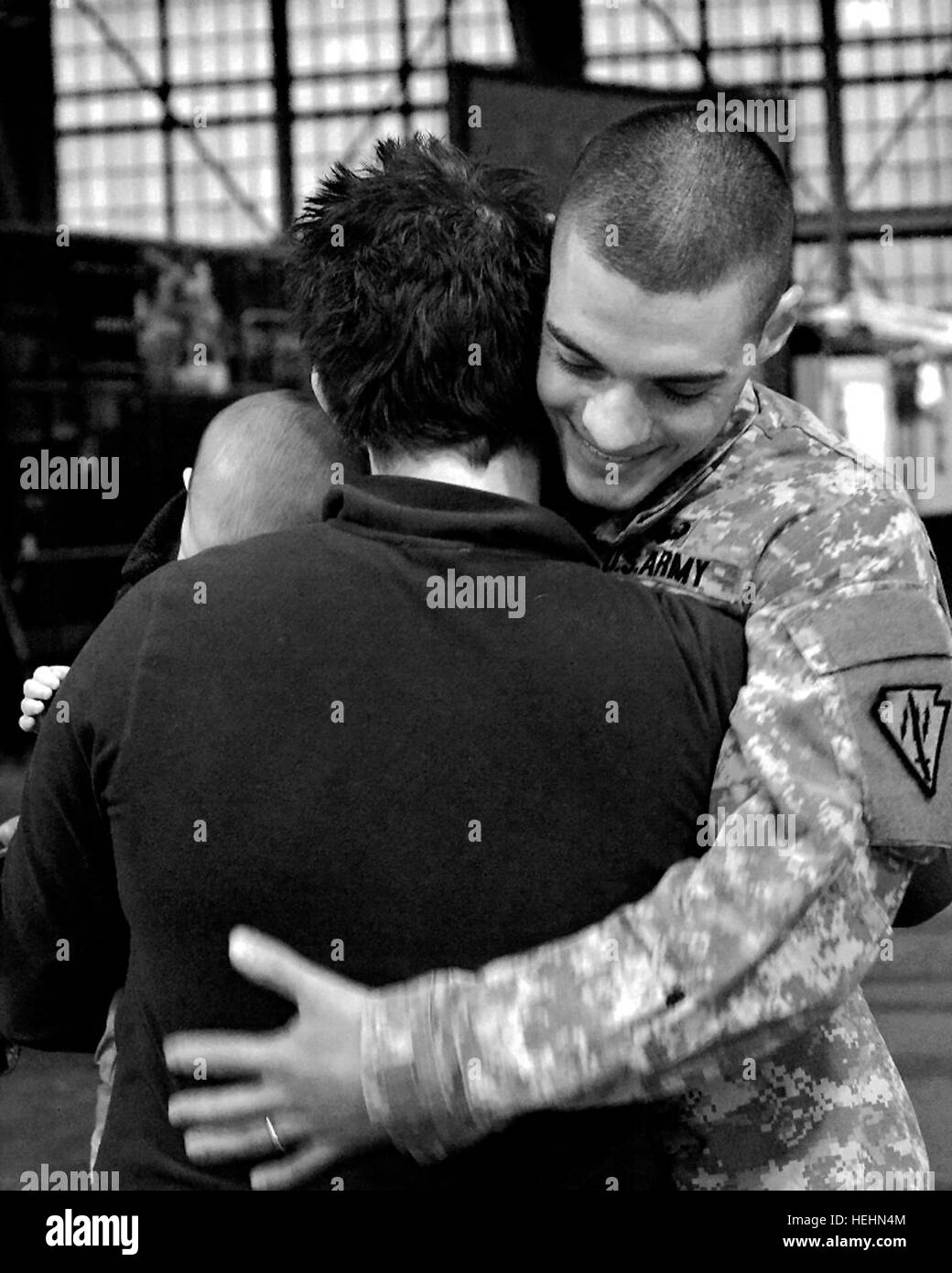 Indiana National Guard 1st Lt. Matt Hygema kisses his wife Christine ...
