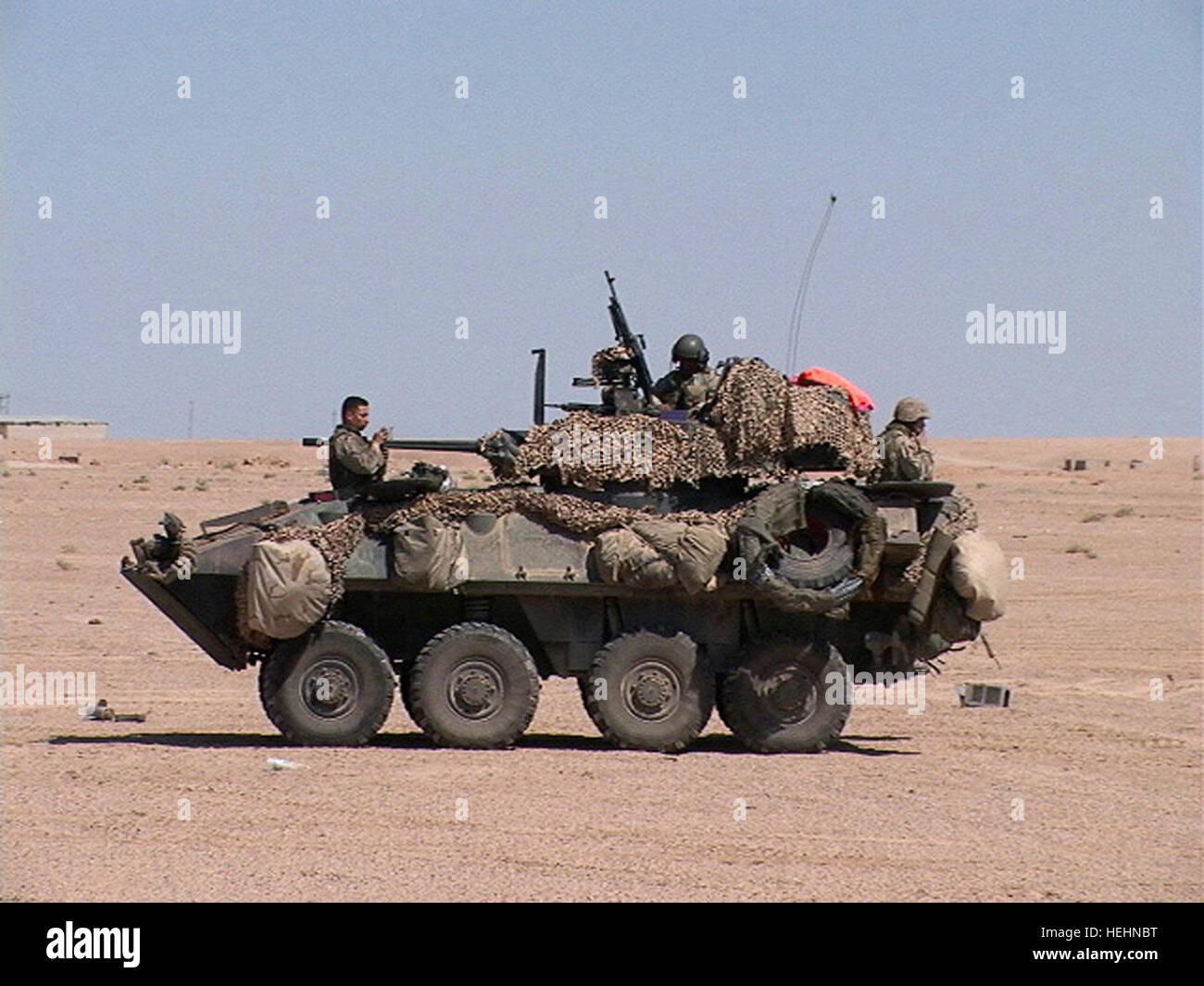 040414-M-9513S-019 14 APR 2004- A Light Armored Reconisance Vehicle ...