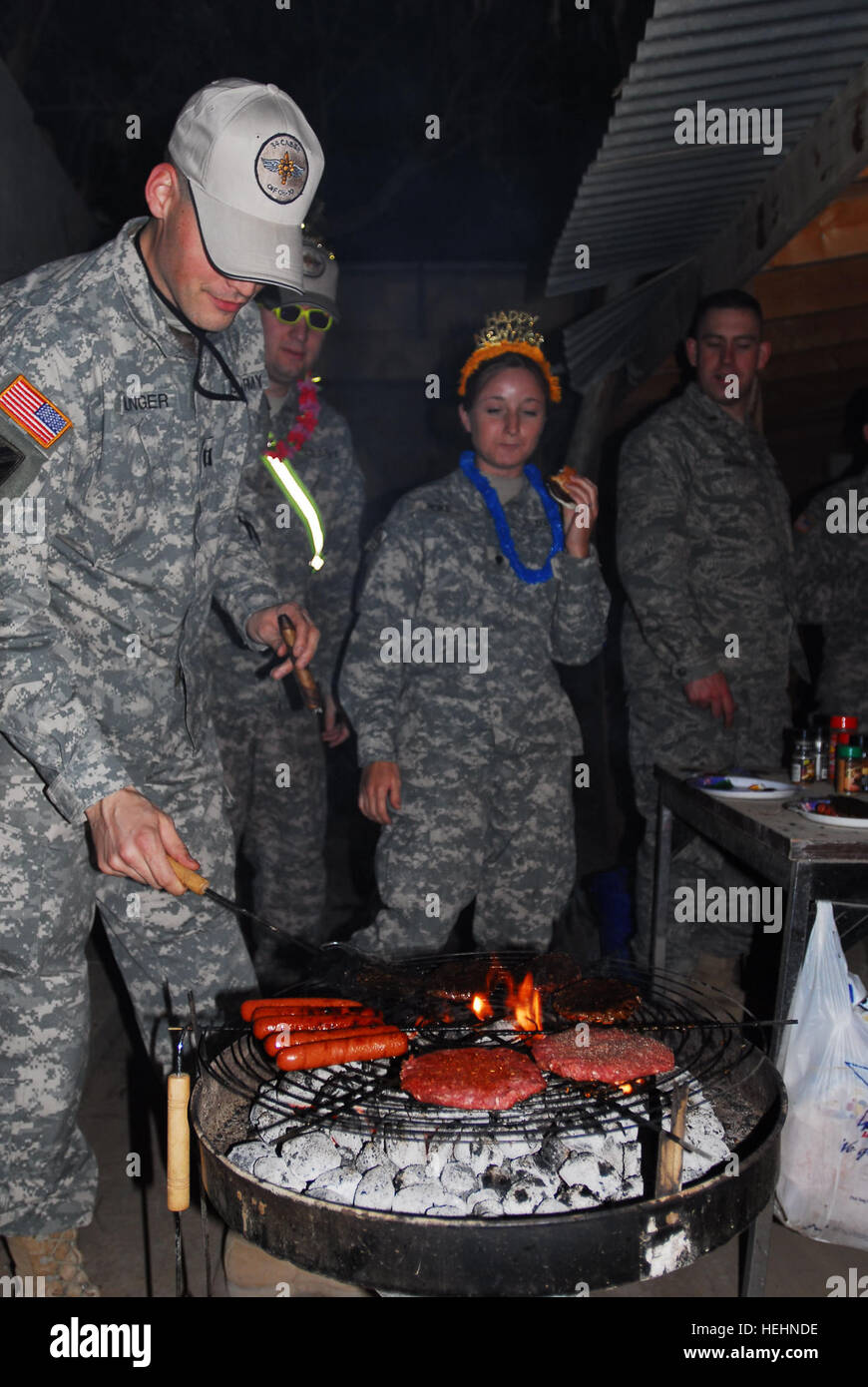 Capt. Joseph Munger of Task Force 34 on Joint Base Balad, Iraq cooks ...