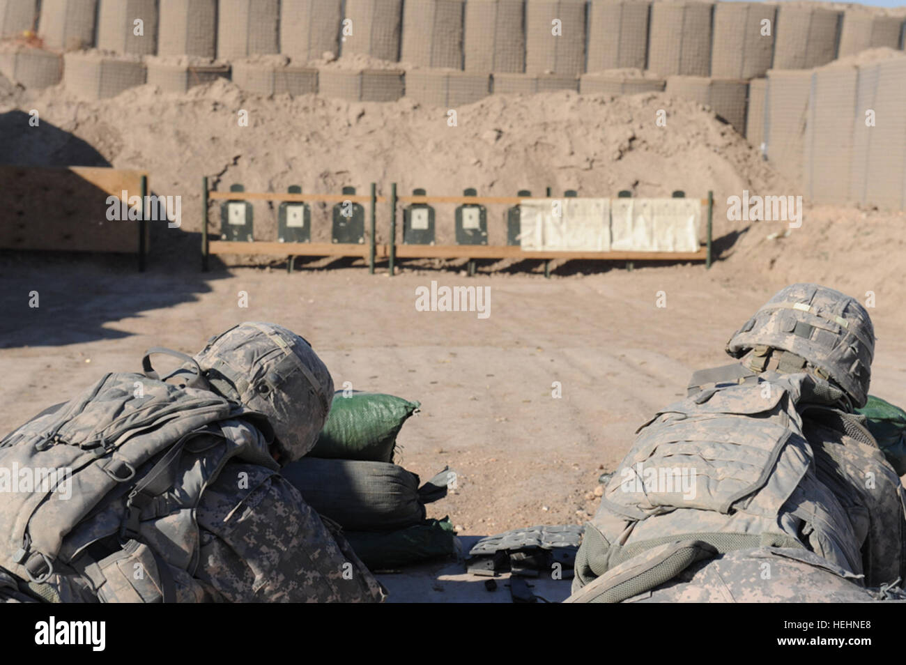 U.S. Army Spc. Carl Justus, of Topeka, Kan., and U.S. Army Spc. Thomas ...