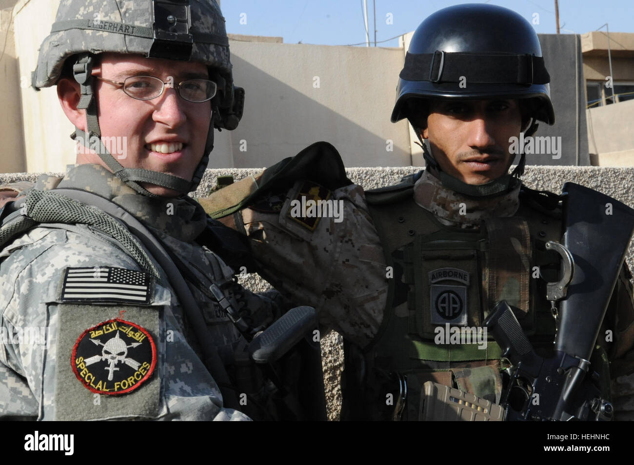 An Iraqi army non-commissioned officer (right) and U.S. Army 1st Lt ...