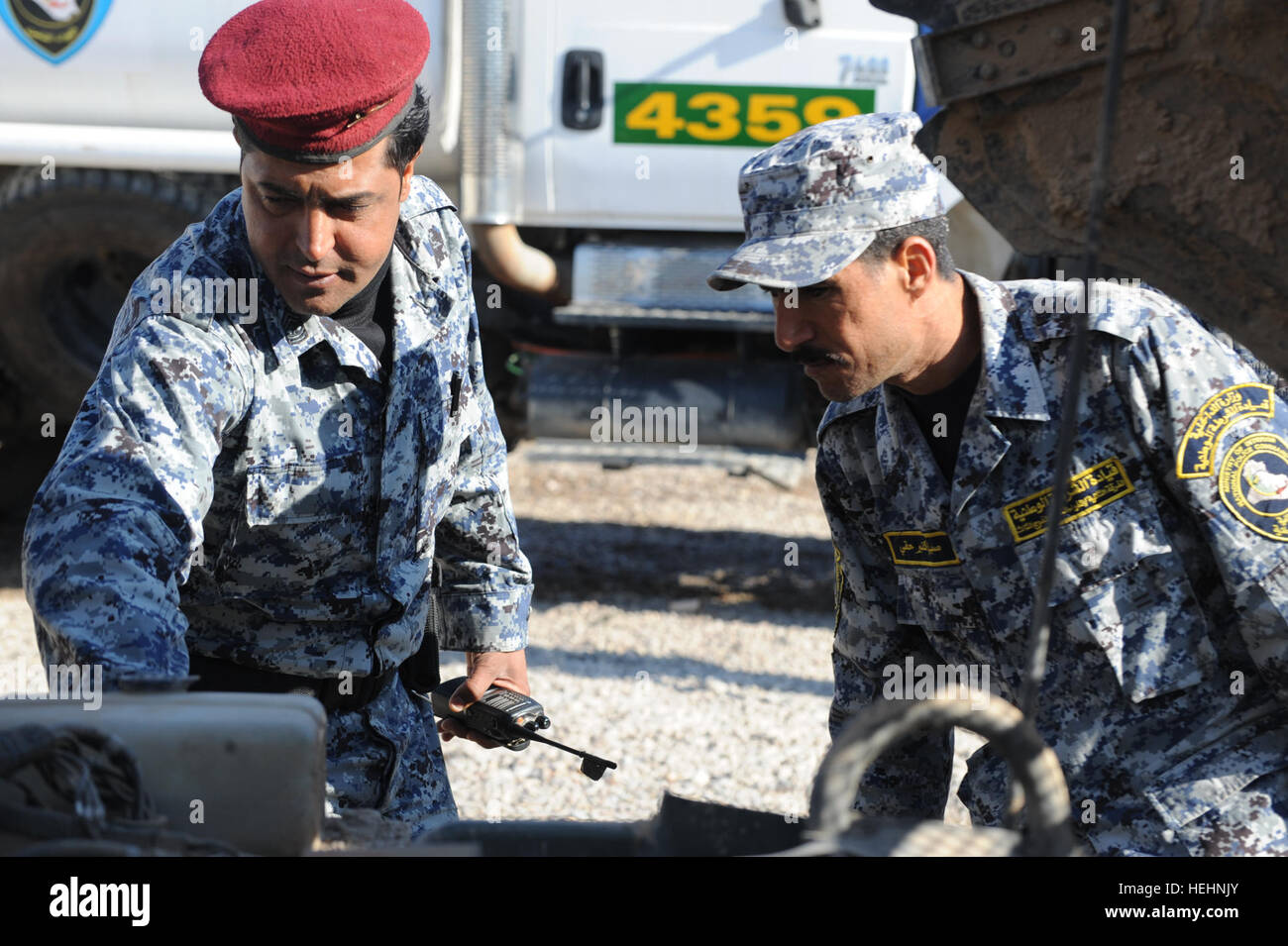 Iraqi national police Sgt. Major Ali (left) of 8th Brigade (Falcon ...