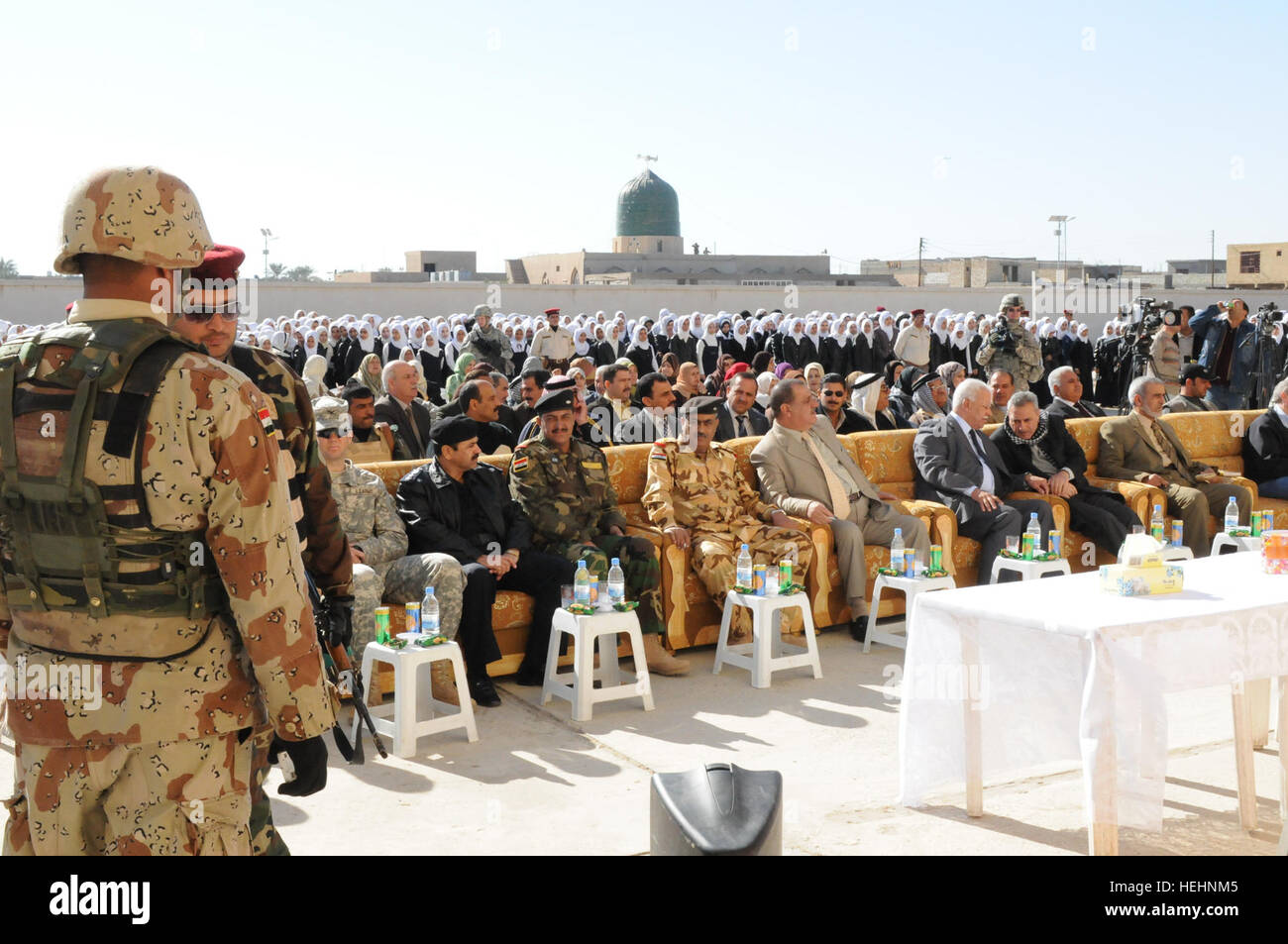 Iraqi government officials and Iraqi students attend the opening ...