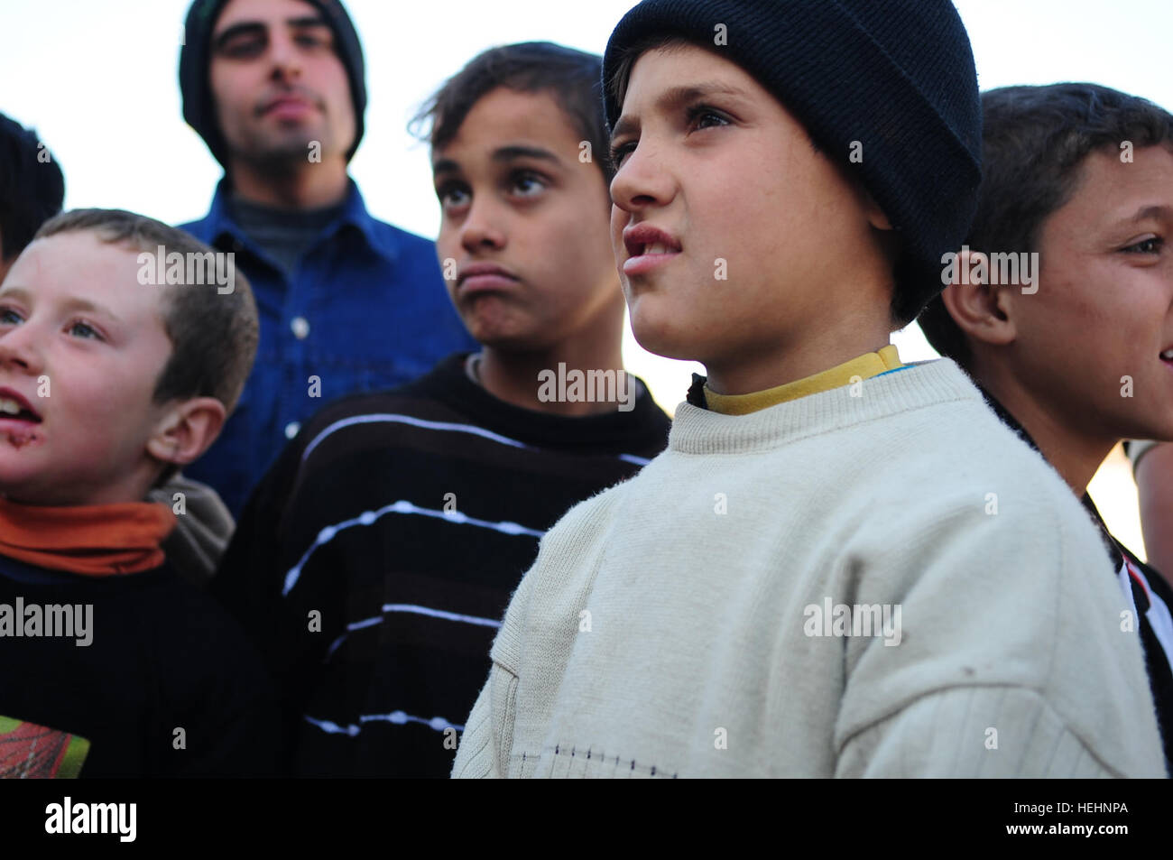 Iraqi boys from Balad, Iraq, talk to U.S. Soldiers from Headquarters ...