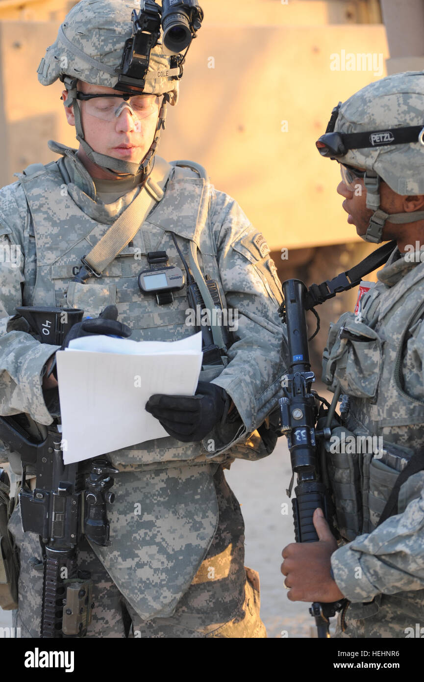 U.S. Army 1st Lt. Logan Cole (left) and 1st Lt. Patrick Bell (right ...