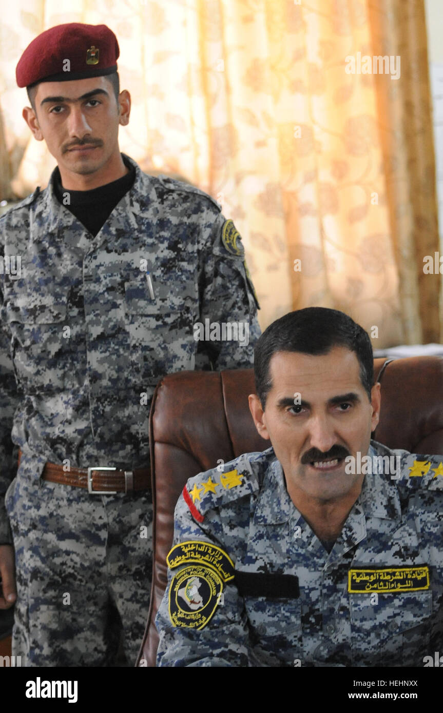 Iraqi national police Col. Bashir (right) of 8th Brigade (Falcon ...