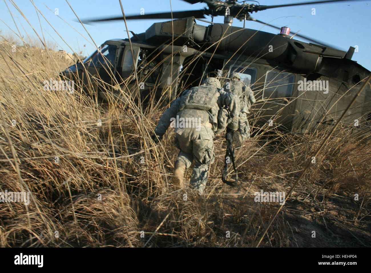 Soldiers from Headquarters and Headquarters Company, 1st Battalion, 27th Infantry Regiment ...