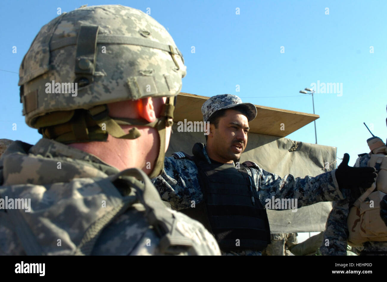 A Paratrooper assigned to the Military Police Platoon, Headquarters and ...