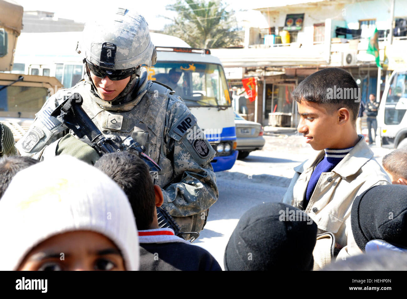A U.S. Soldier with the 21st Military Police Company, 3rd Platoon out ...