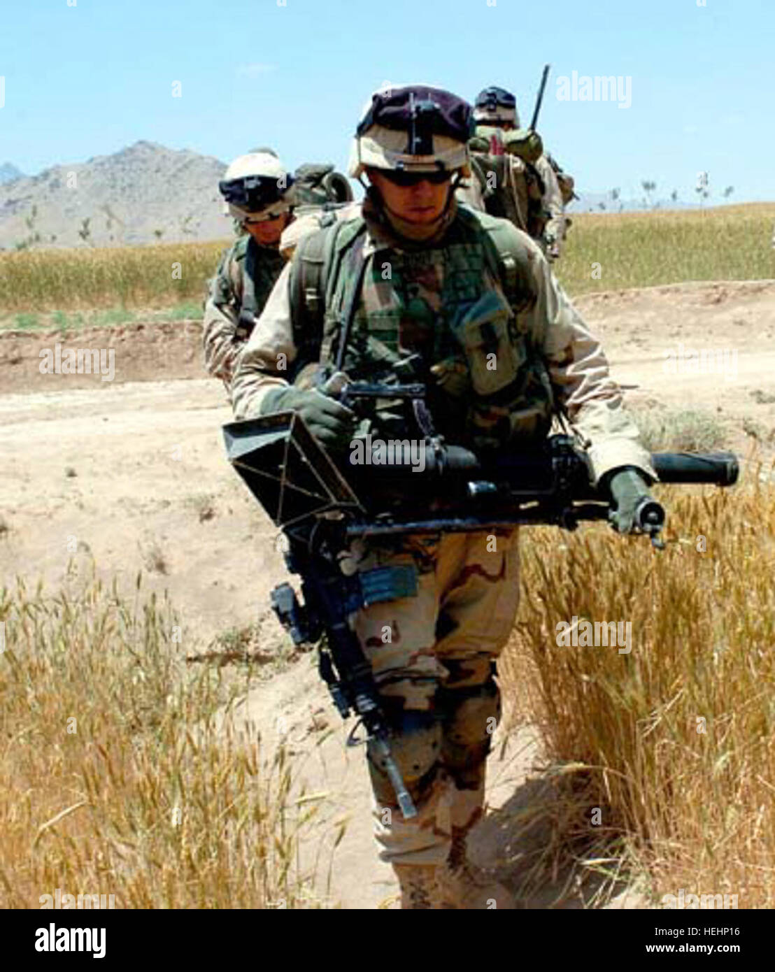 Spc. Mathew Root, C Co. 2-35 Infantry mortarman marches in the Argandab ...