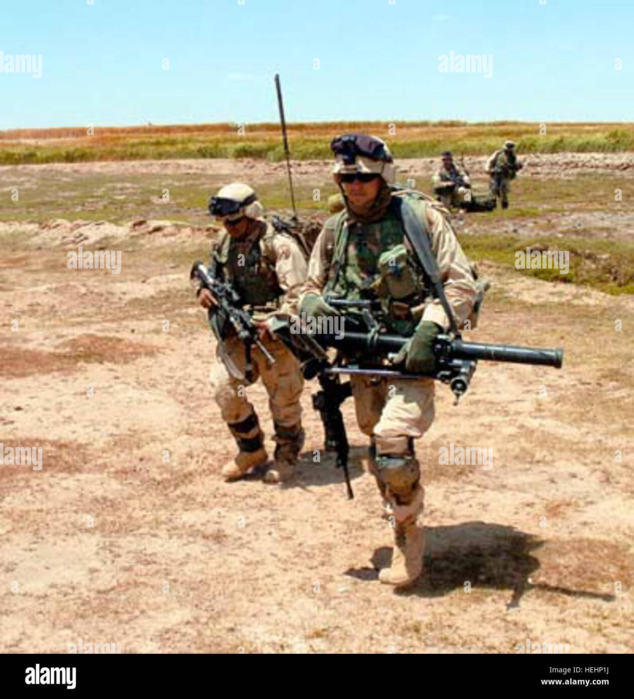 Spc. Mathew Root, C Co. 2-35 Infantry mortarman marches in the Argandab ...