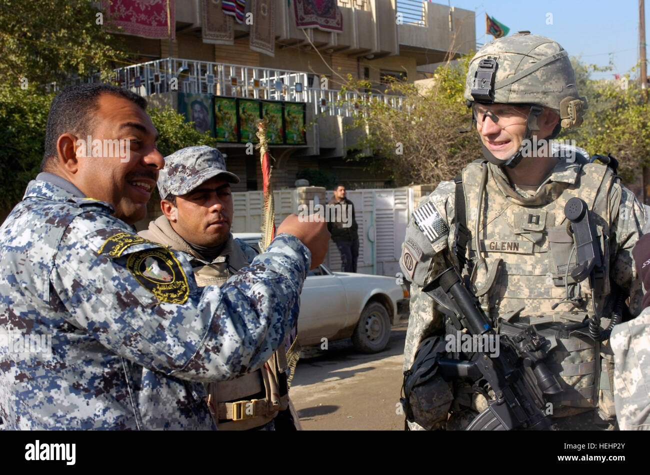 U.S. Army paratroopers and Iraqi National Police conduct a dismounted ...