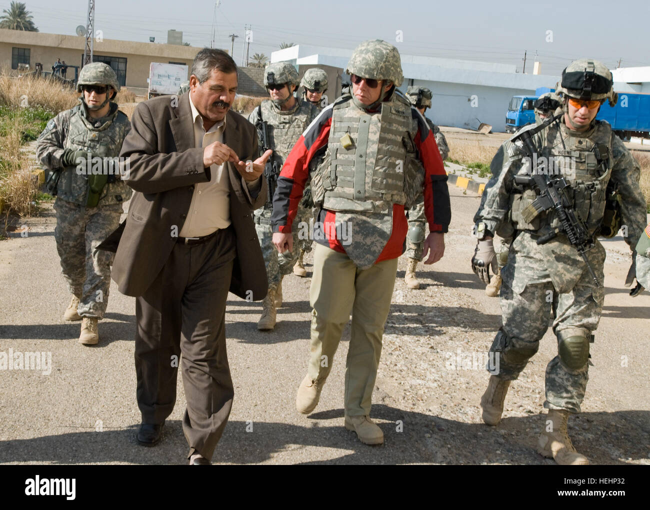 Mr. Ahmed Ibrahim Aghab, owner of the Balad canning factory, gives a ...