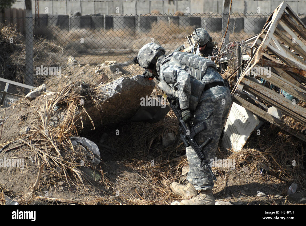 U.S. Army Staff Sgt. Eric Hummel, with the 2nd Brigade, 1st Infantry ...