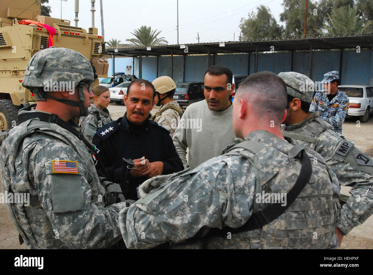 Soldiers from the 772nd Military Police Company engage with Iraqi ...