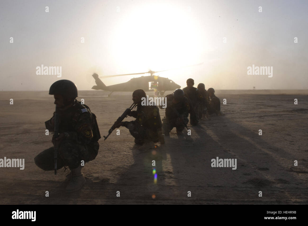 Iraqi policemen from the Dhi Qar province pull security during an air ...