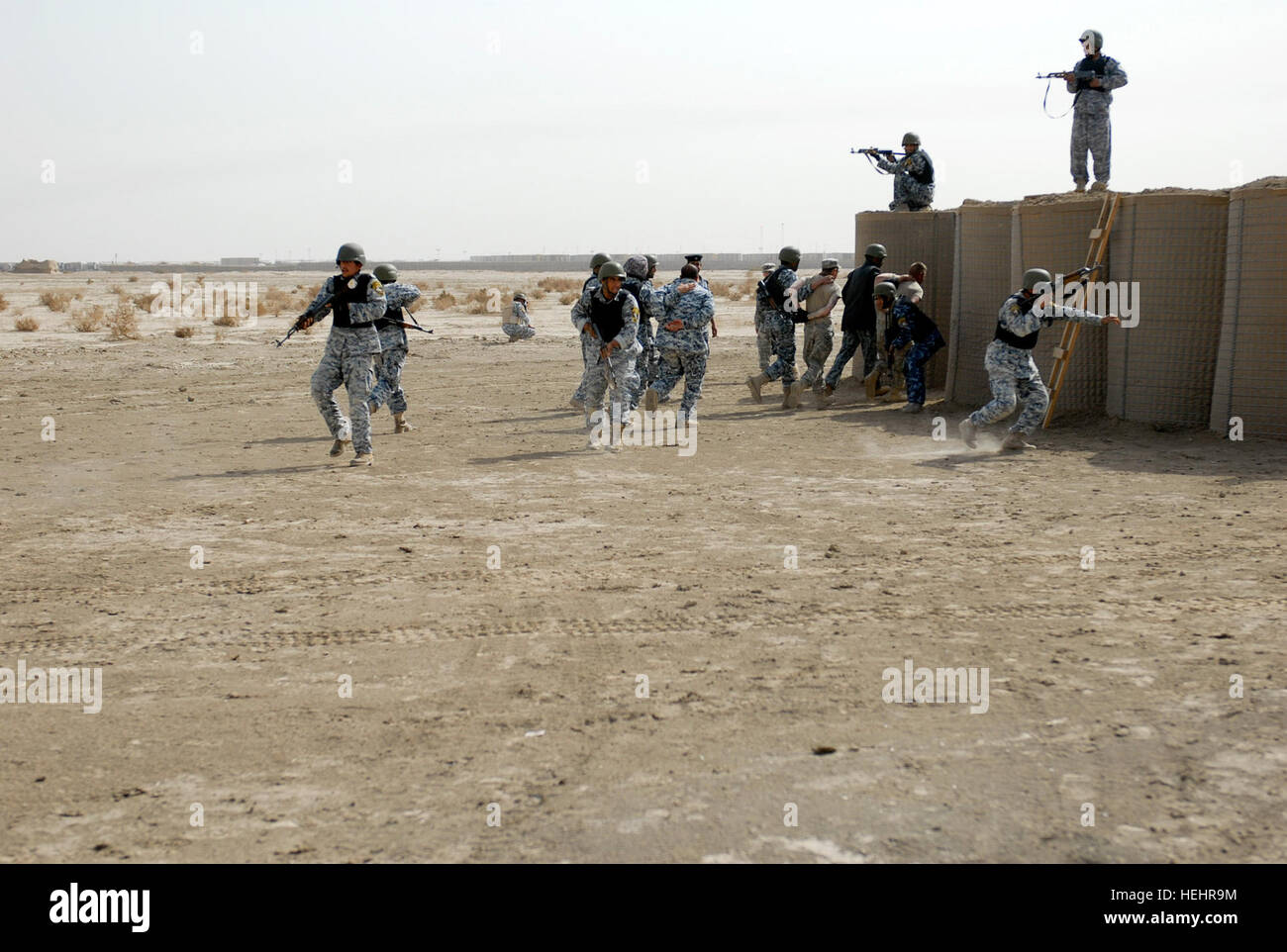 Iraqi policemen, from the Muthana Tactical Security Unit in southern ...