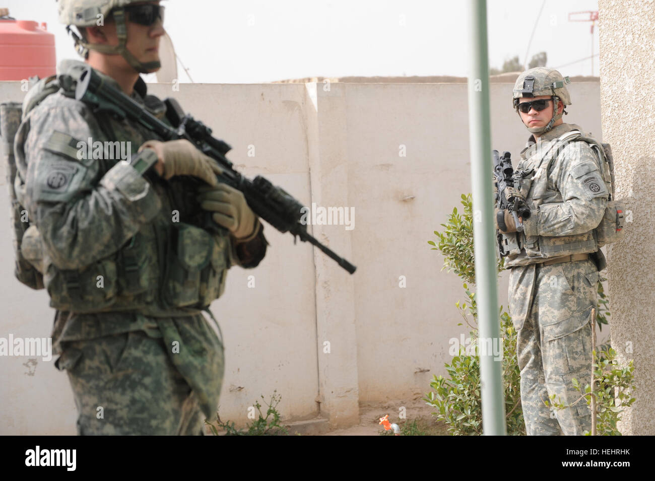 U.S. Army Staff Sgt. Matthew Vittorelli (left) and Pfc. Timothy Kenney ...