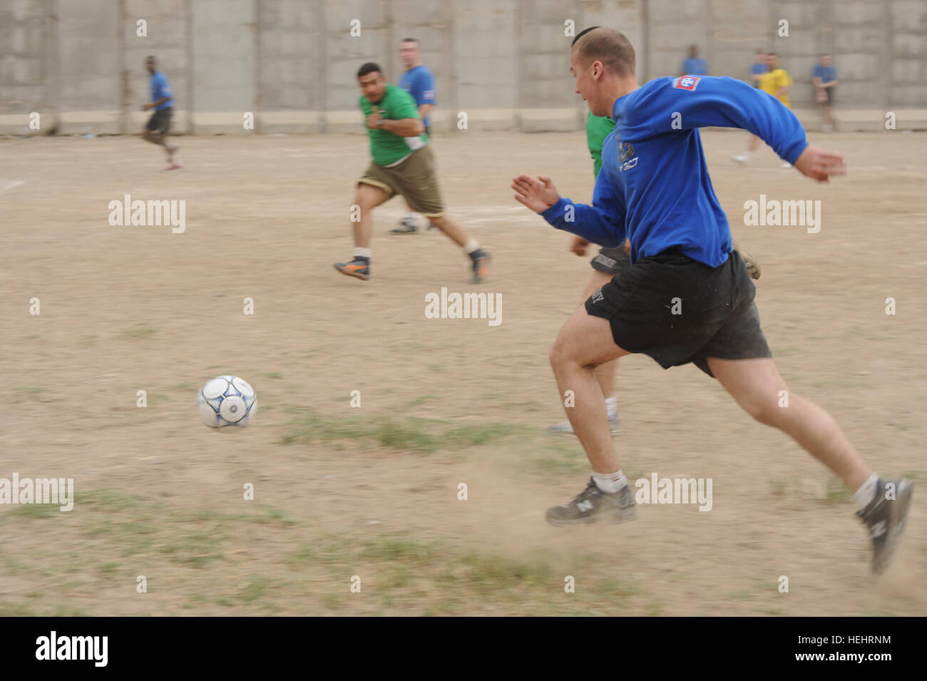 Iraqi soccer players and a U.S. Soldier of 2nd Battalion, 505th ...