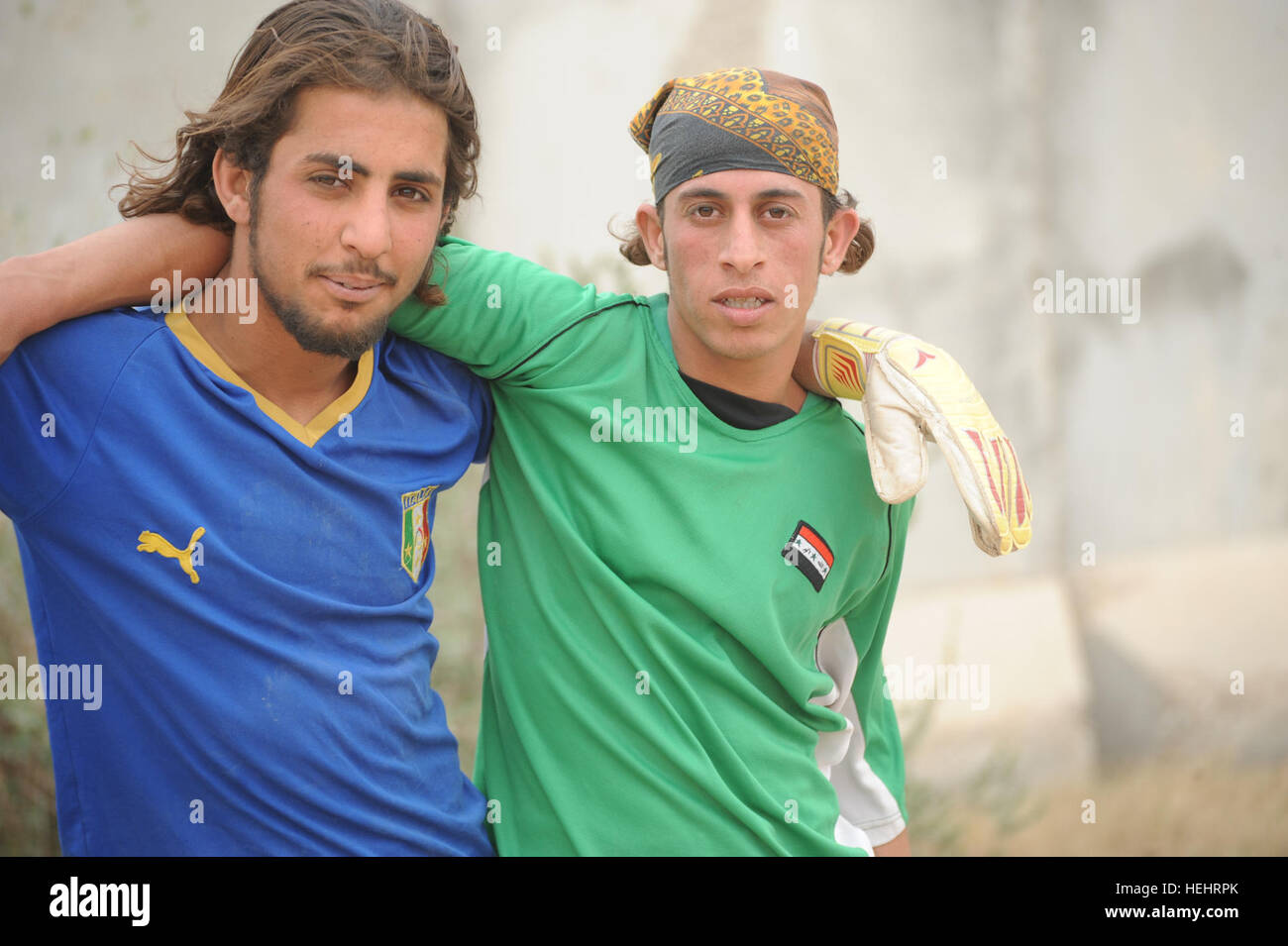 Iraqi soccer players pose for the camera, after a friendly game of ...