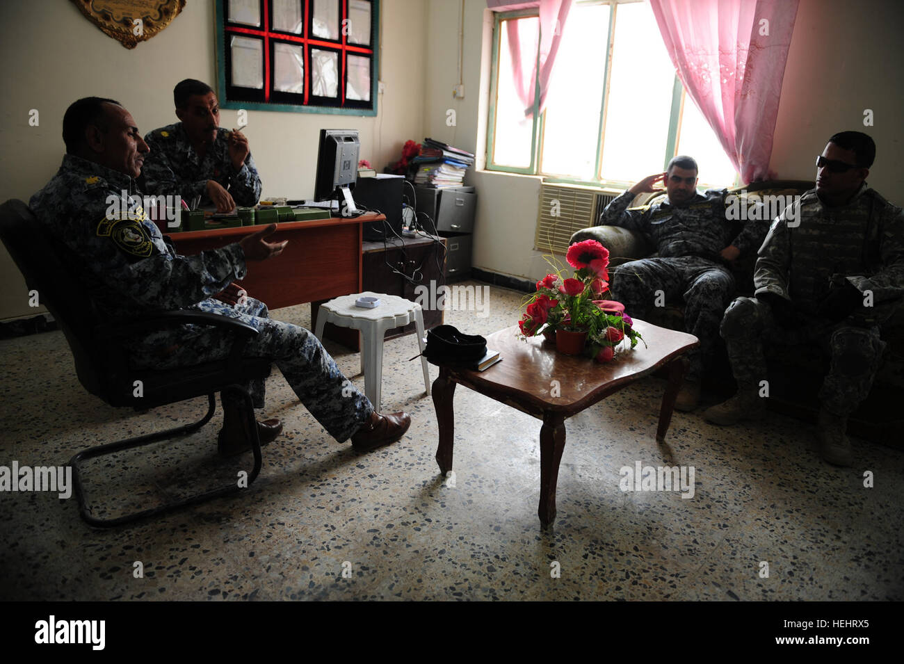 Iraqi police officers from 7th IP Brigade, 2nd IP Division, have a ...