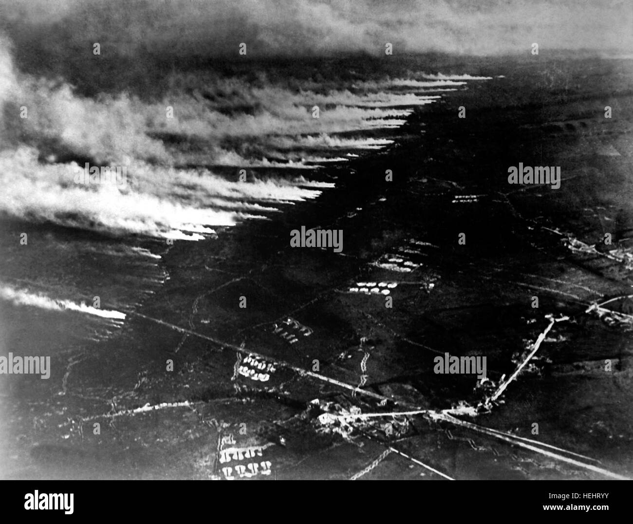 French soldiers conduct a gas and flame attack on German trenches in ...