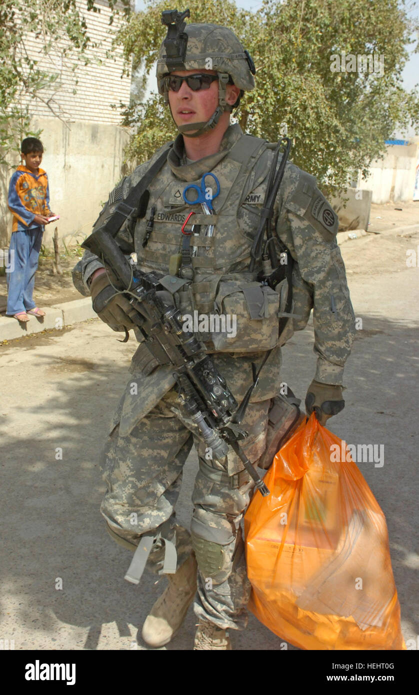 Pfc. Robert Edwards, a medic assigned to the Military Police platoon ...