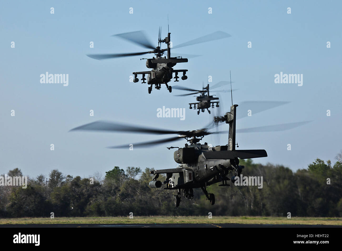 At the Beaumont Municipal Airport, three AH-64D Apache Attack ...