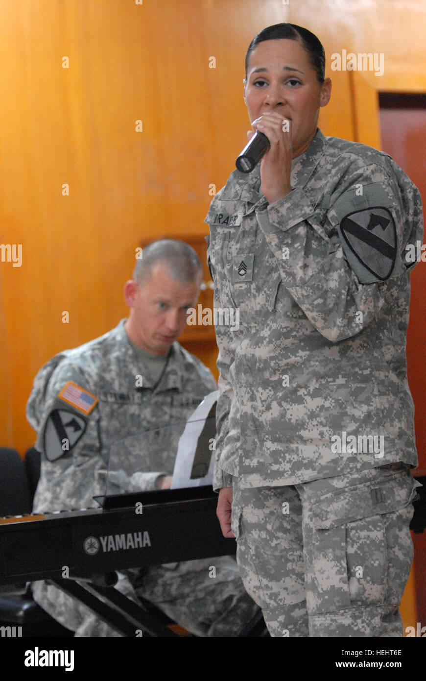 Staff Sgt. Renatta Draper (right), accompanied by Staff Sgt. Jeffrey ...