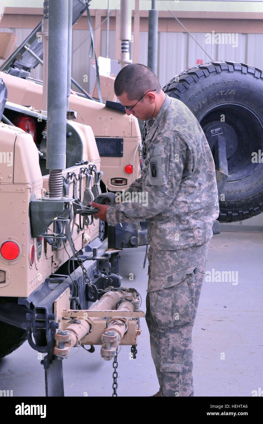 Spc. Anthony Jimenez does Pre-Combat Inspections and Checks at Camp ...
