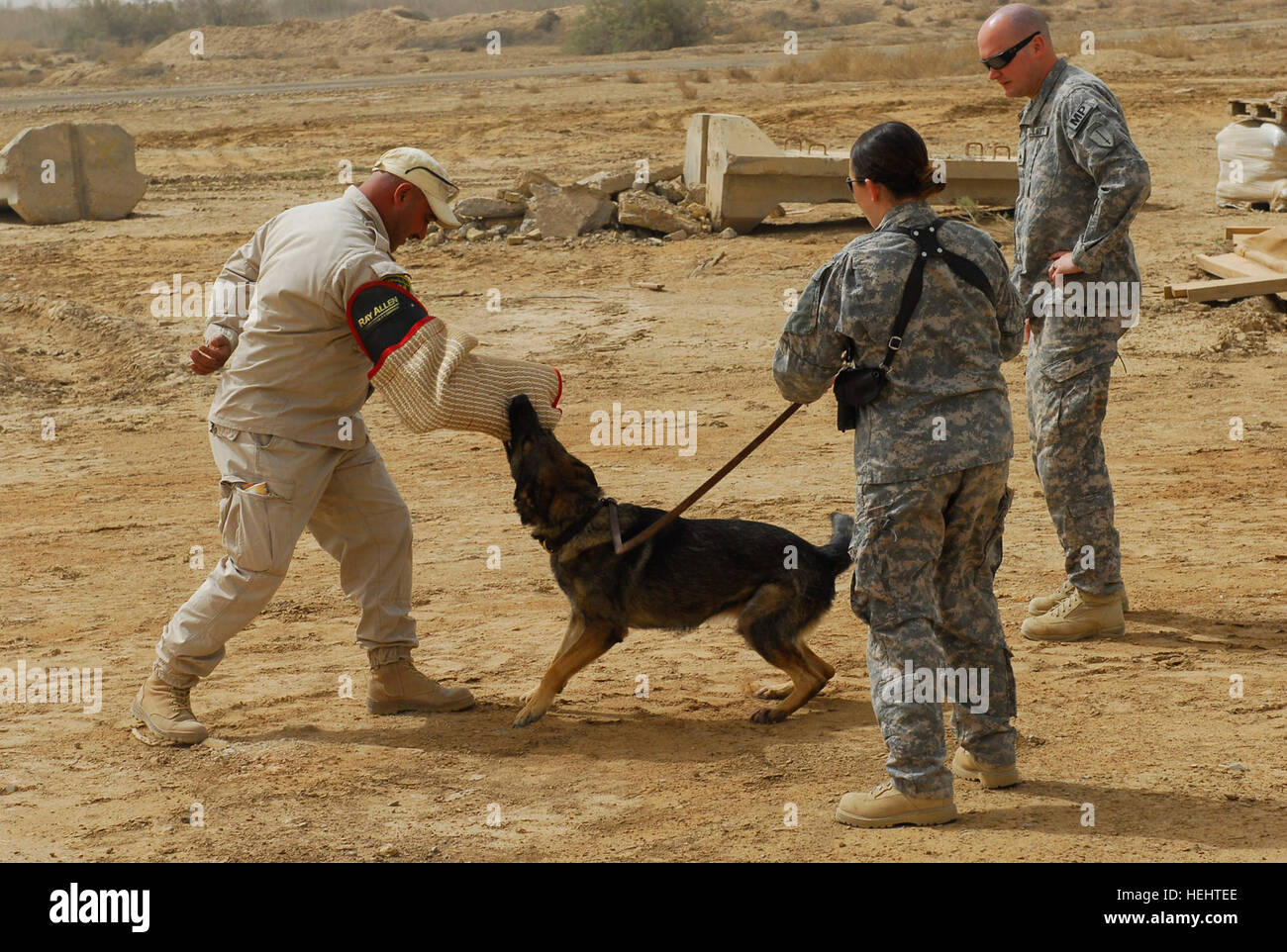 Iraqi policeman Sgt. Sarug Sa'ad Hamed practices using the bite wrap ...