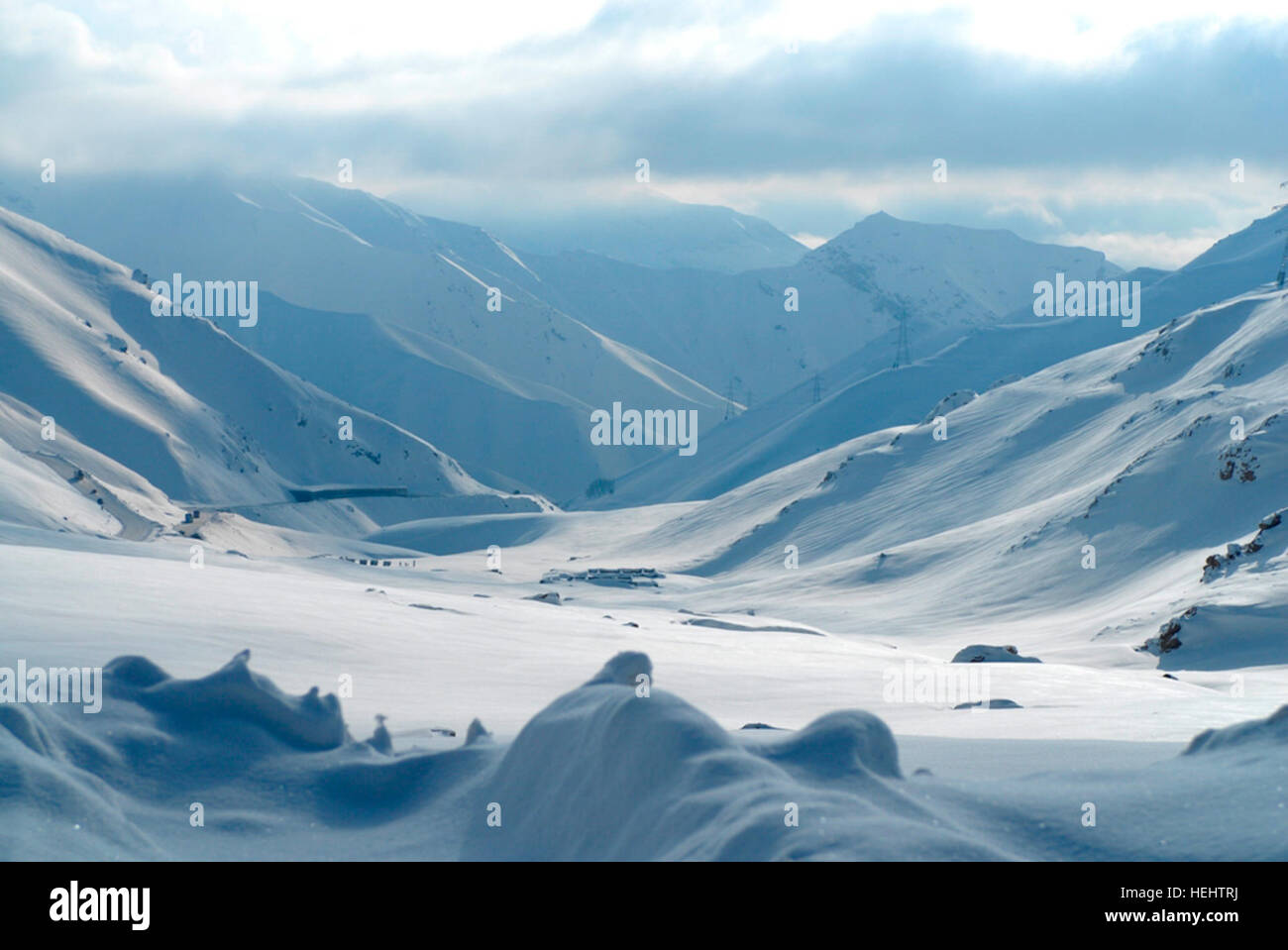 Snow covered mountains are shown just outside of Afghanistan's Salang ...