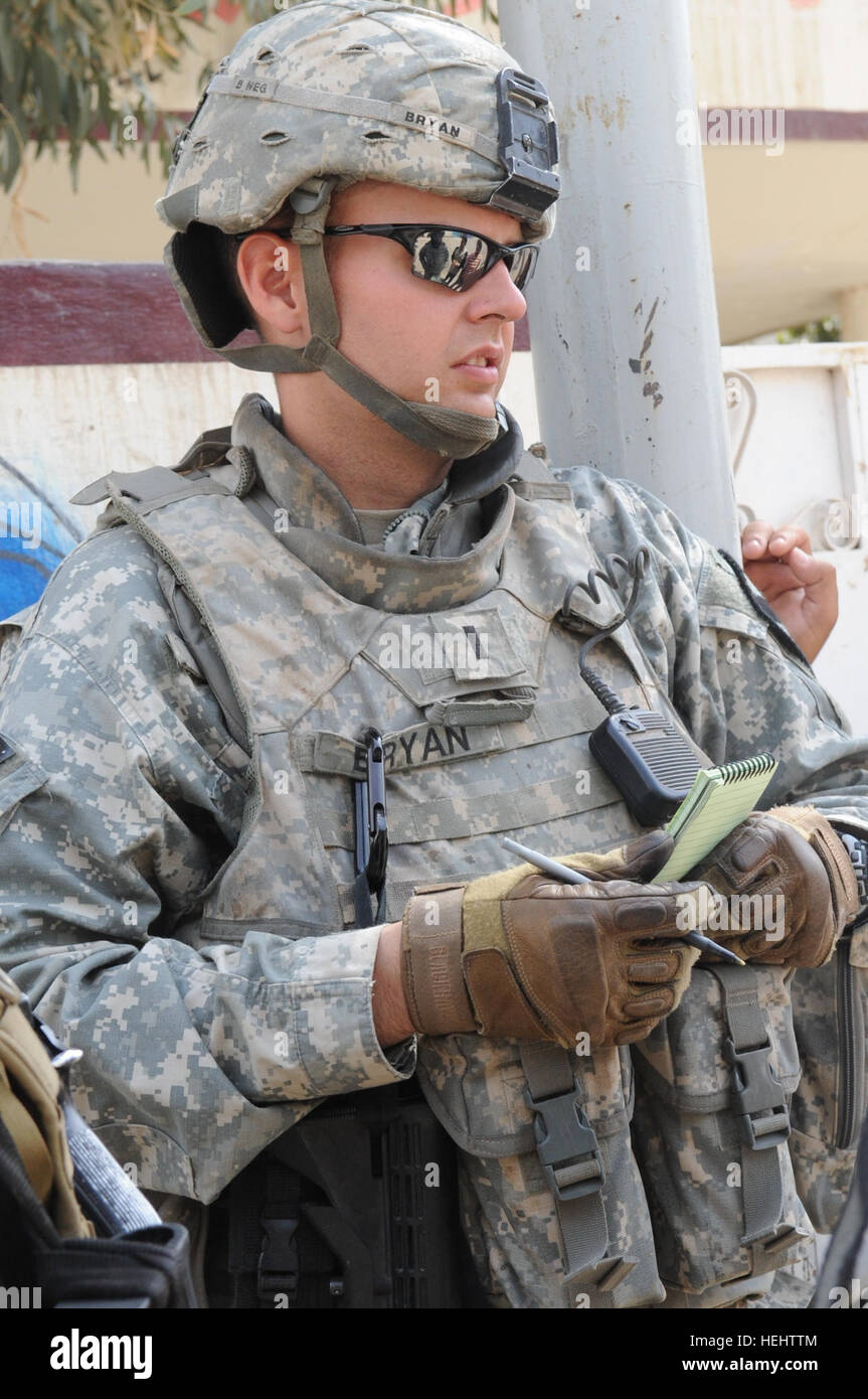 U.S. Army 1st Lt. Nicholas Bryan from Athens, Ala., asks an Iraqi ...