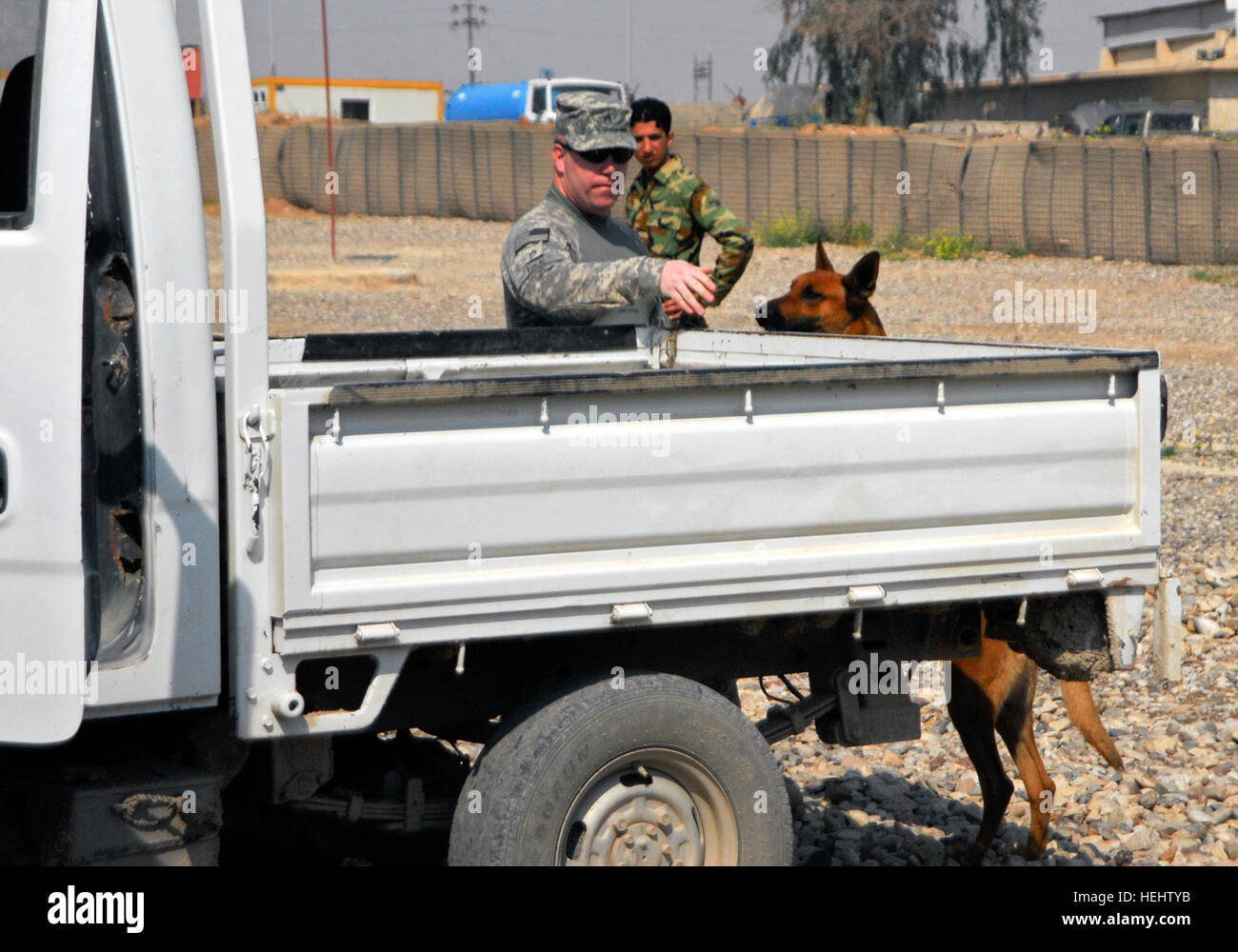 Rronnie and his handler, Staff Sgt. Michael Hile with the 527th ...